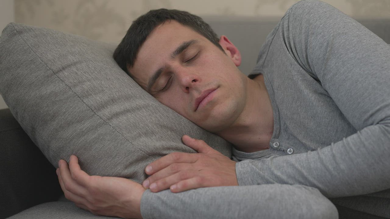 Man sleeping through smoke from a house fire - Free Stock Video