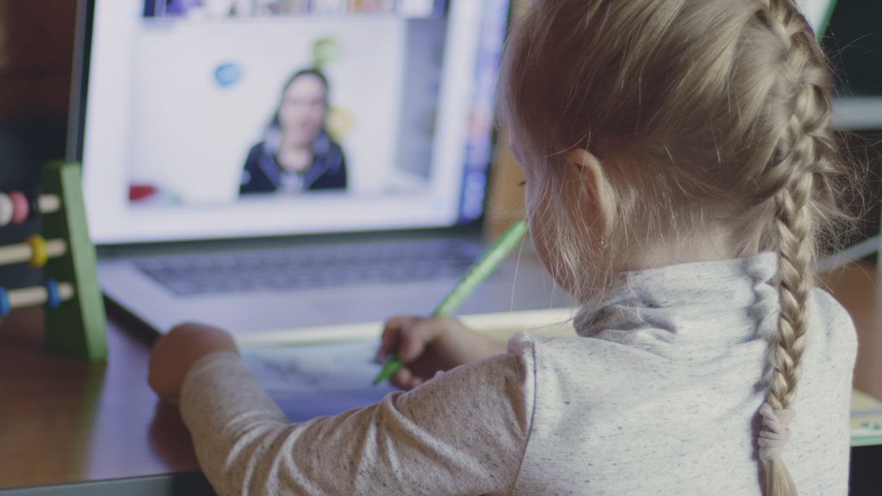 Little girl doing online classes during COVID lockdown - Free Stock Video
