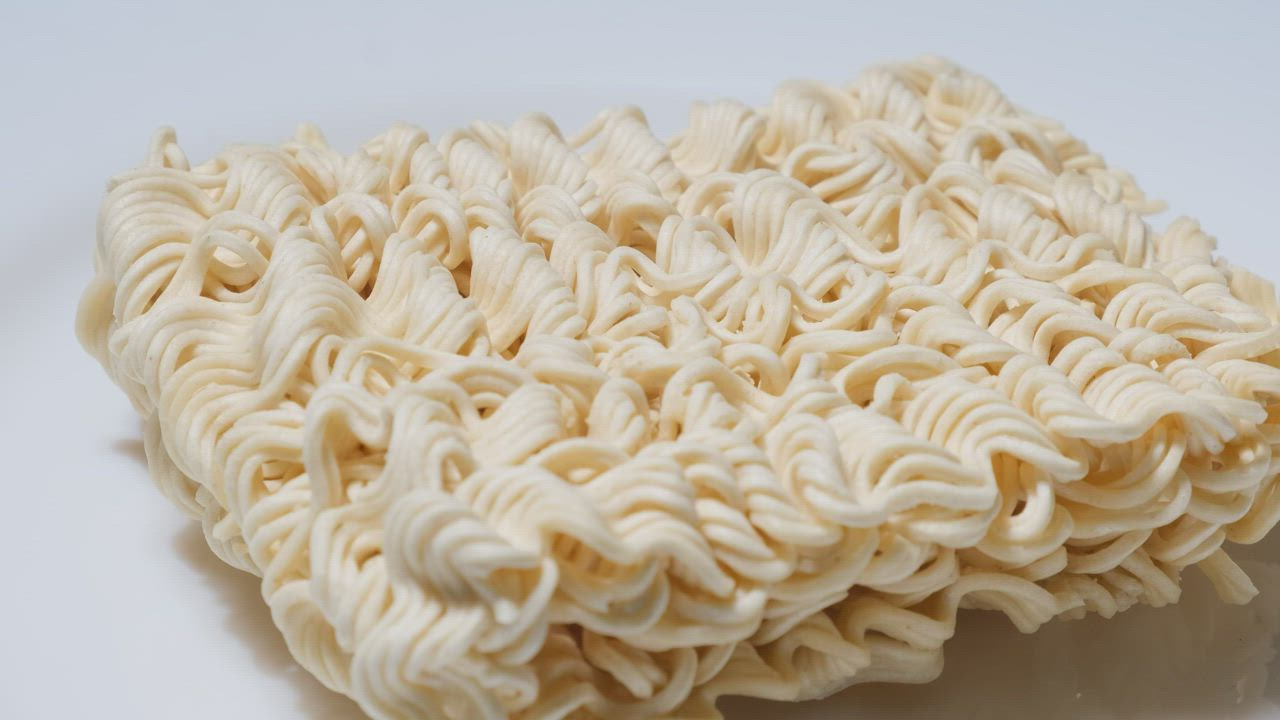 Dry instant noodles on white rotary surface before cooking - Free Stock ...