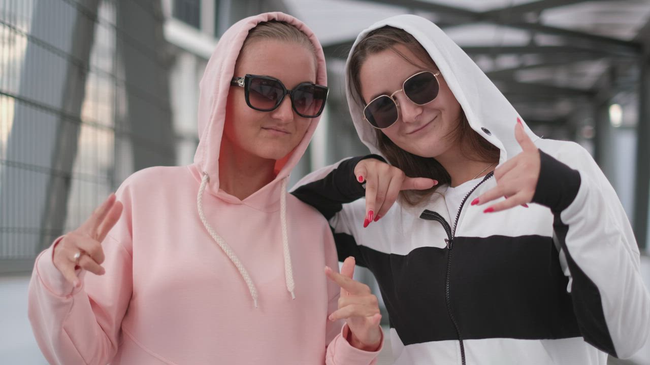 Two girls with rapper attitude - Free Stock Video
