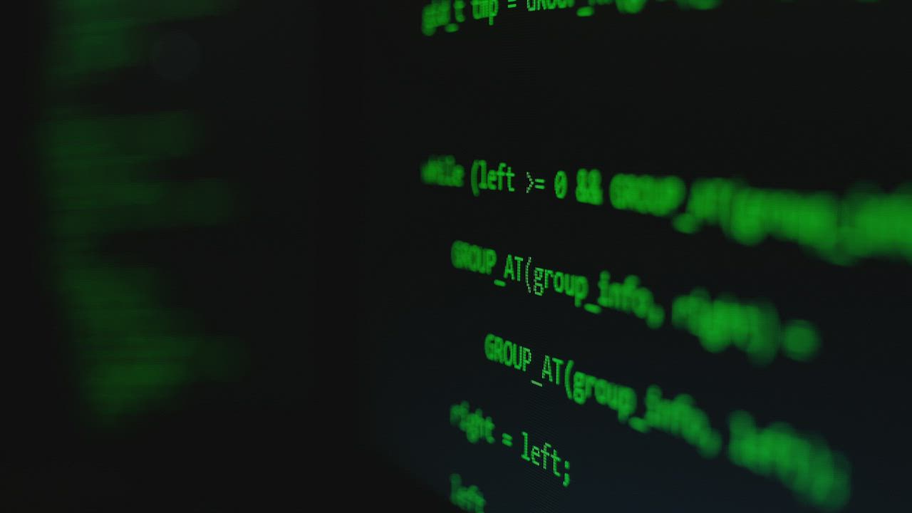 Code on green letters on screen - Free Stock Video