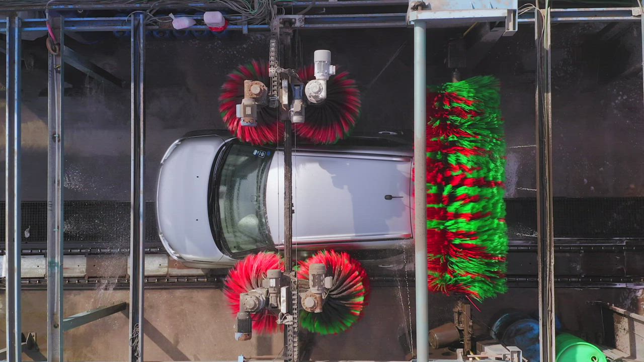 Aerial view of a car being washed - Free Stock Video