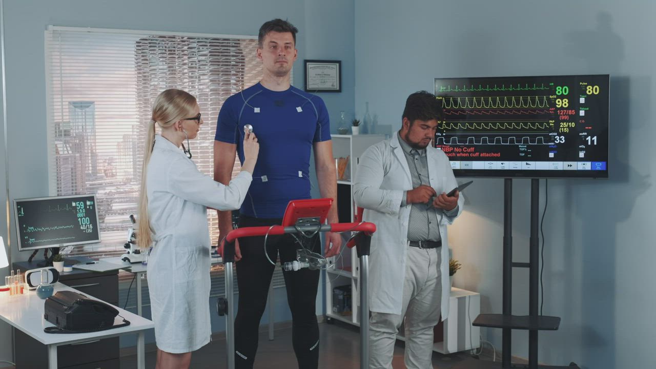 Cardiologists monitoring a professional athlete in a sports lab - Free ...