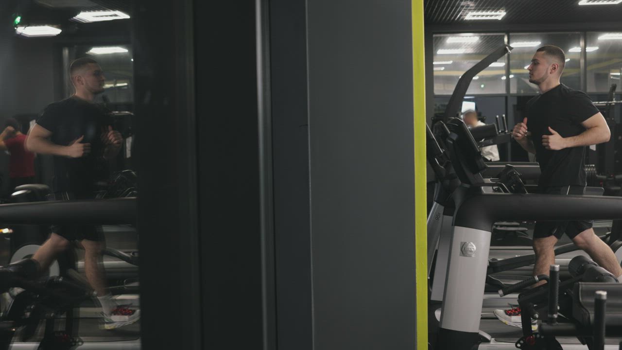 Young man does cardio workout - Free Stock Video