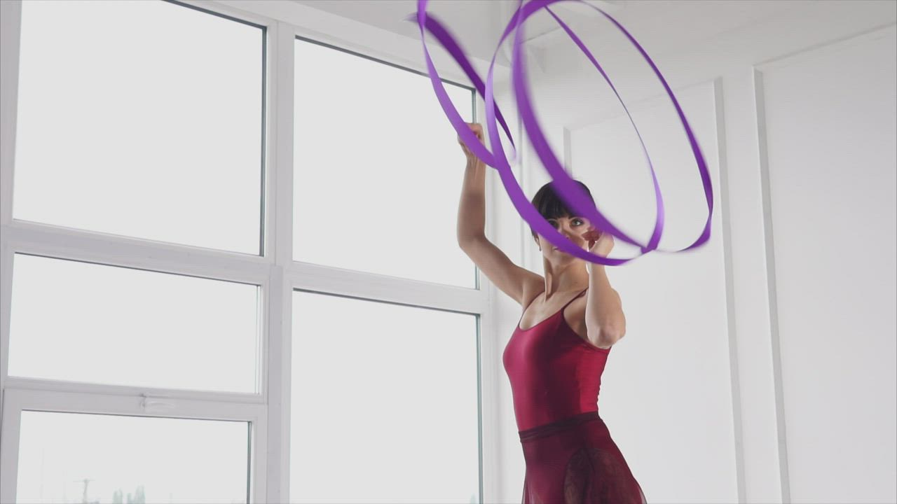 Ribbon gymnast in a practice session - Free Stock Video