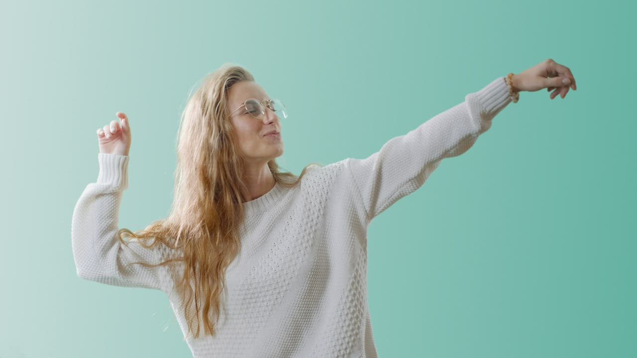 Cheerful and positive woman dancing - Free Stock Video