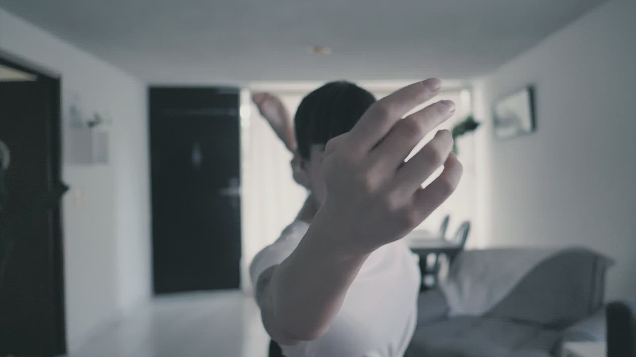 Girl staying static in a yoga pose - Free Stock Video