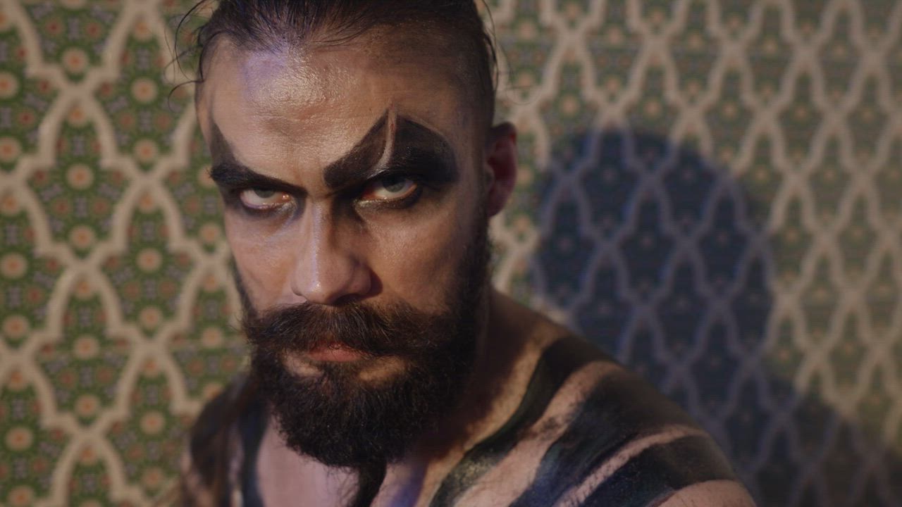 Angry man with war paint - Free Stock Video