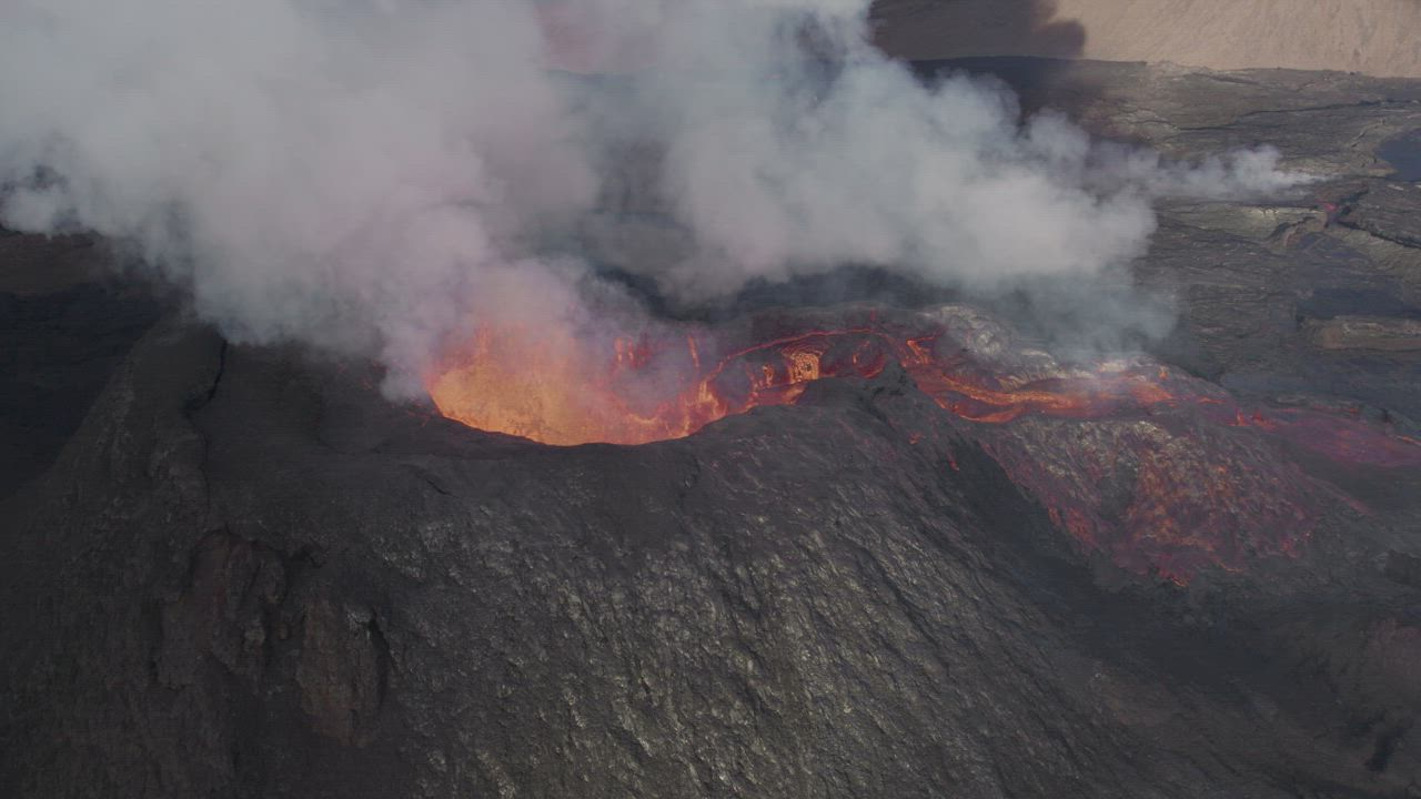 Drone view of a erupting volcano - Free Stock Video