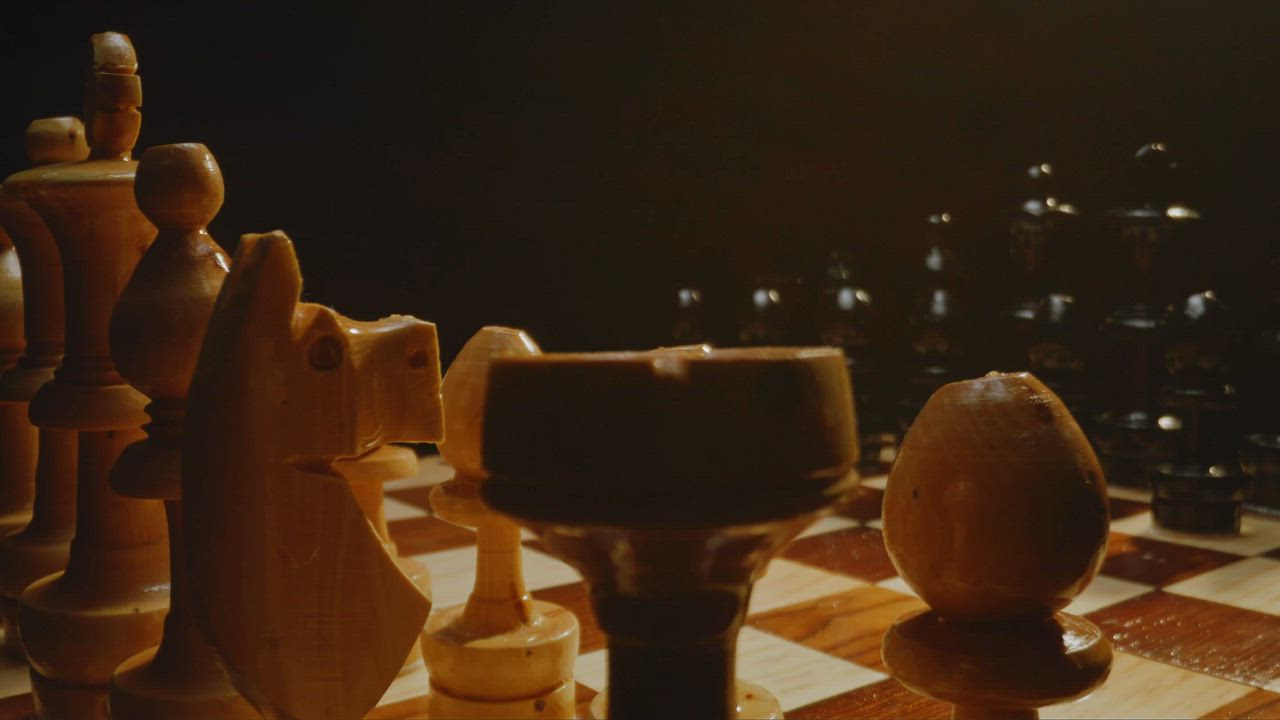 Close look at a wooden chess board - Free Stock Video
