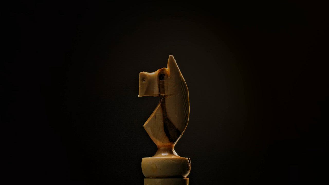 Wooden chess knight rotating slowly - Free Stock Video