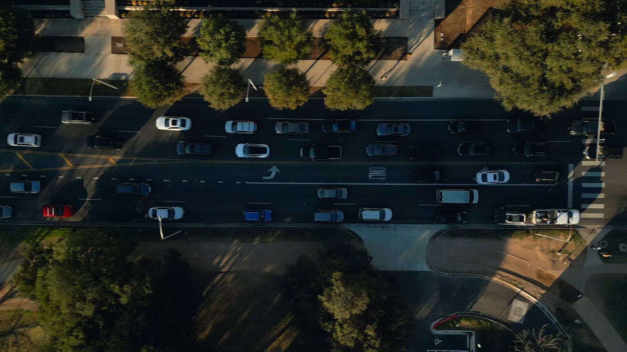 Aerial overhead shot of a highway in a city - Free Stock Video