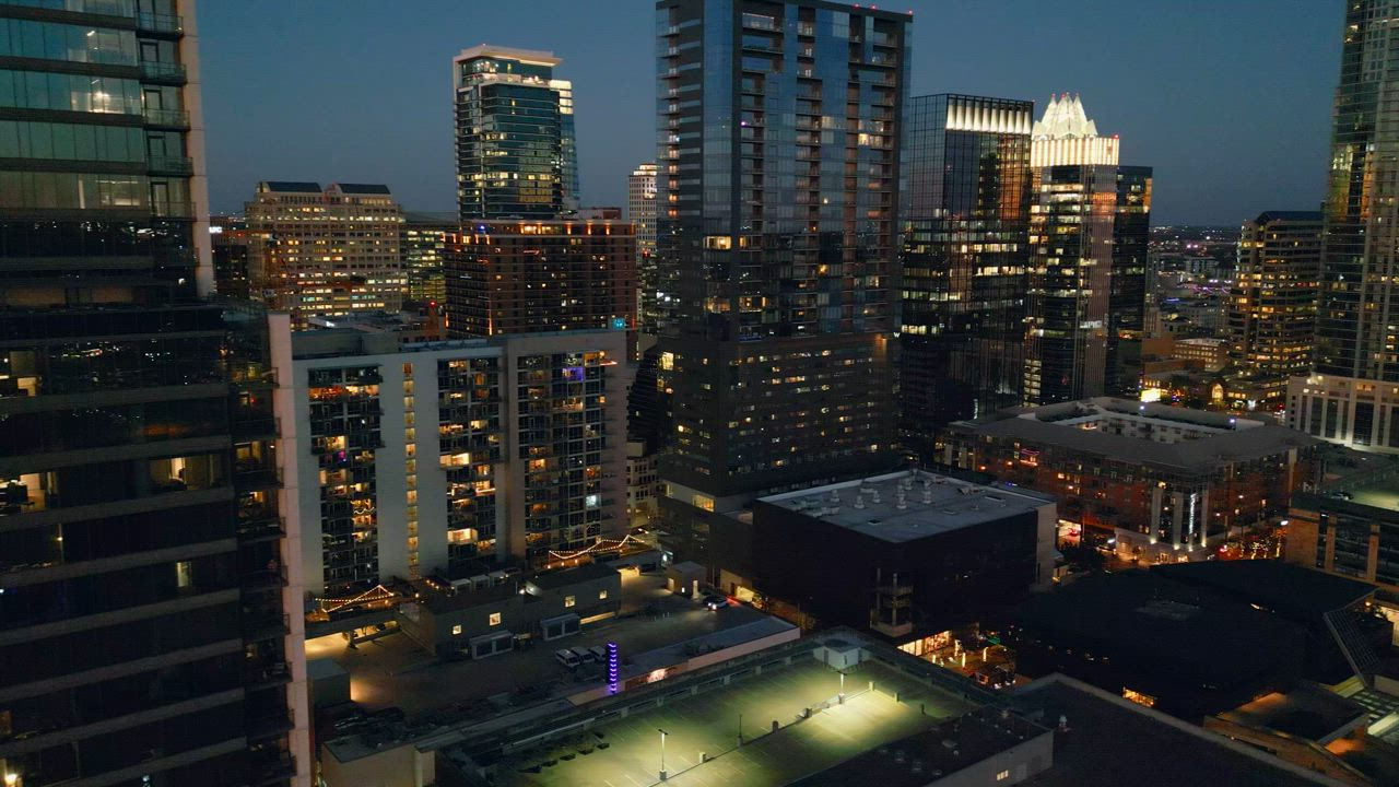 Aerial view of a big city between the buildings - Free Stock Video