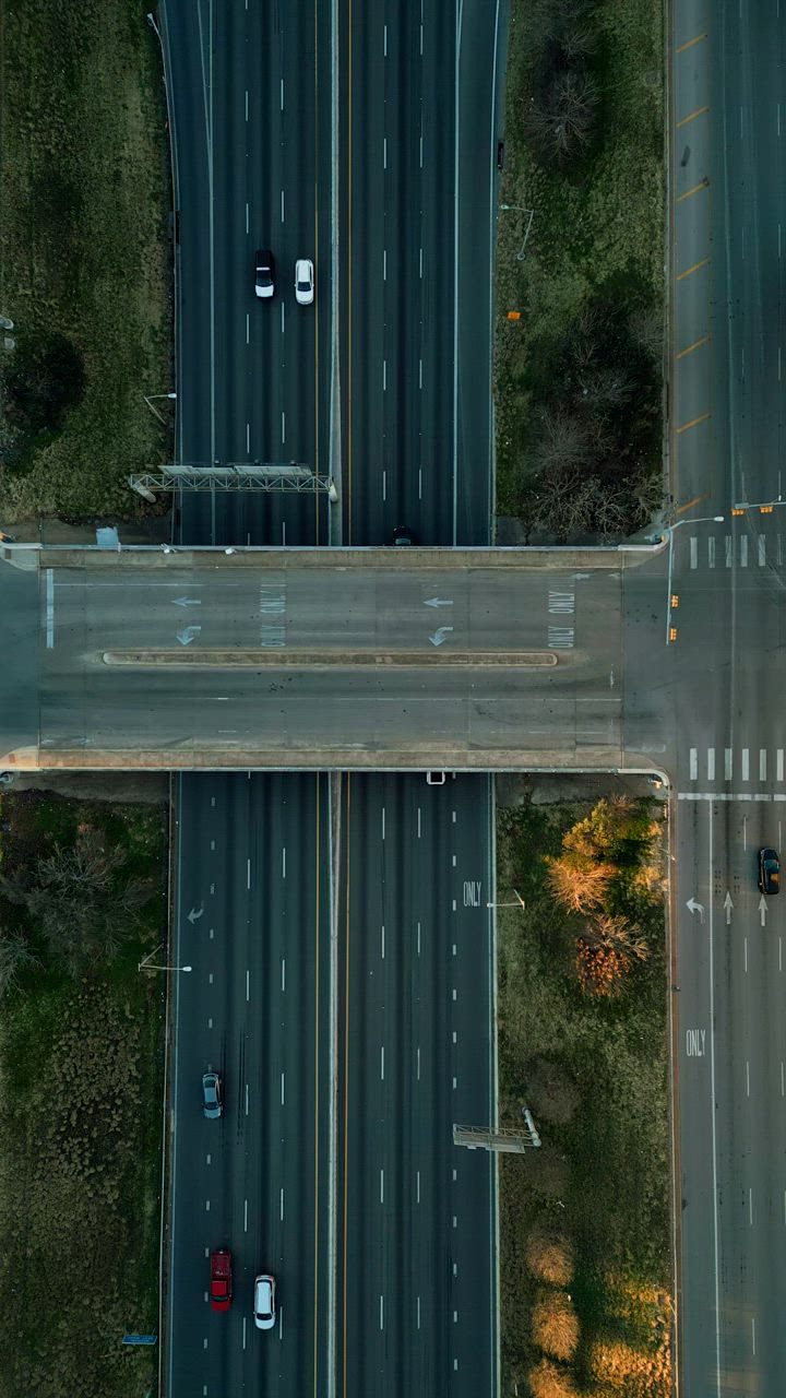 Highway with cars in an overhead aerial view - Free Stock Video
