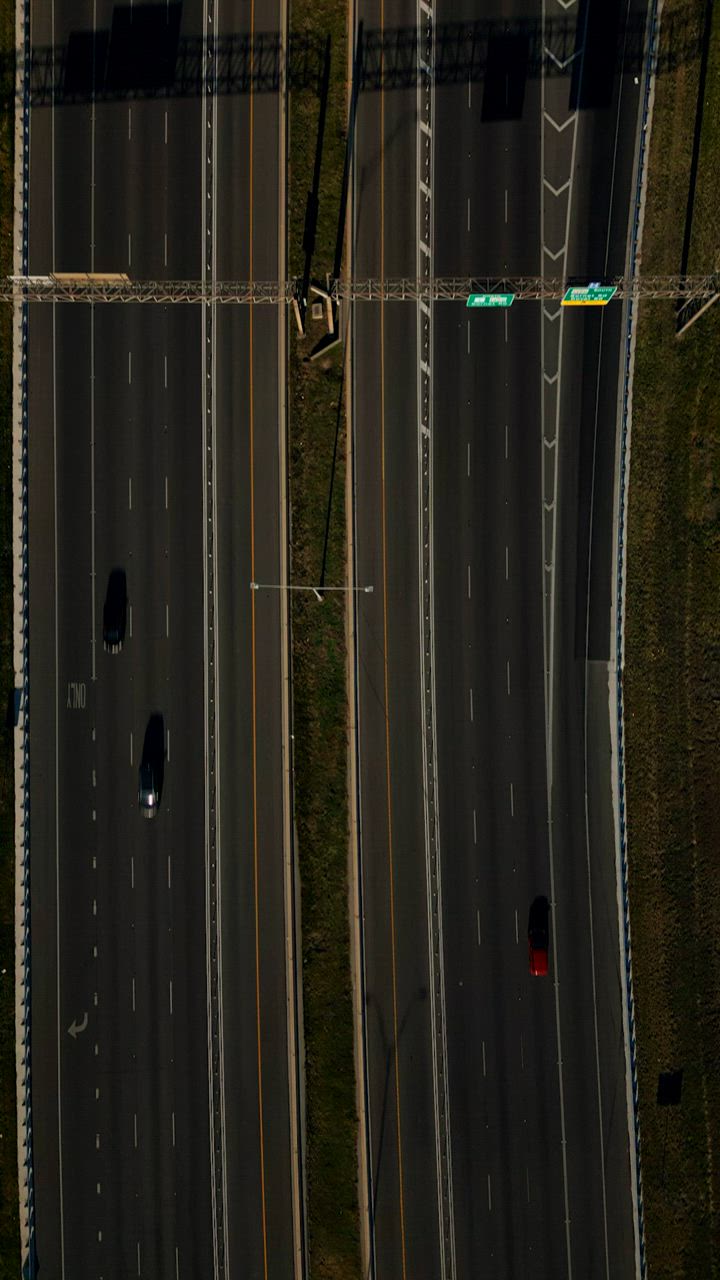Two-way highway in an overhead aerial view - Free Stock Video