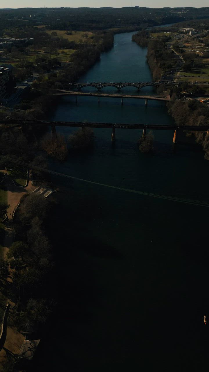 Big river with bridges in an aerial shot - Free Stock Video