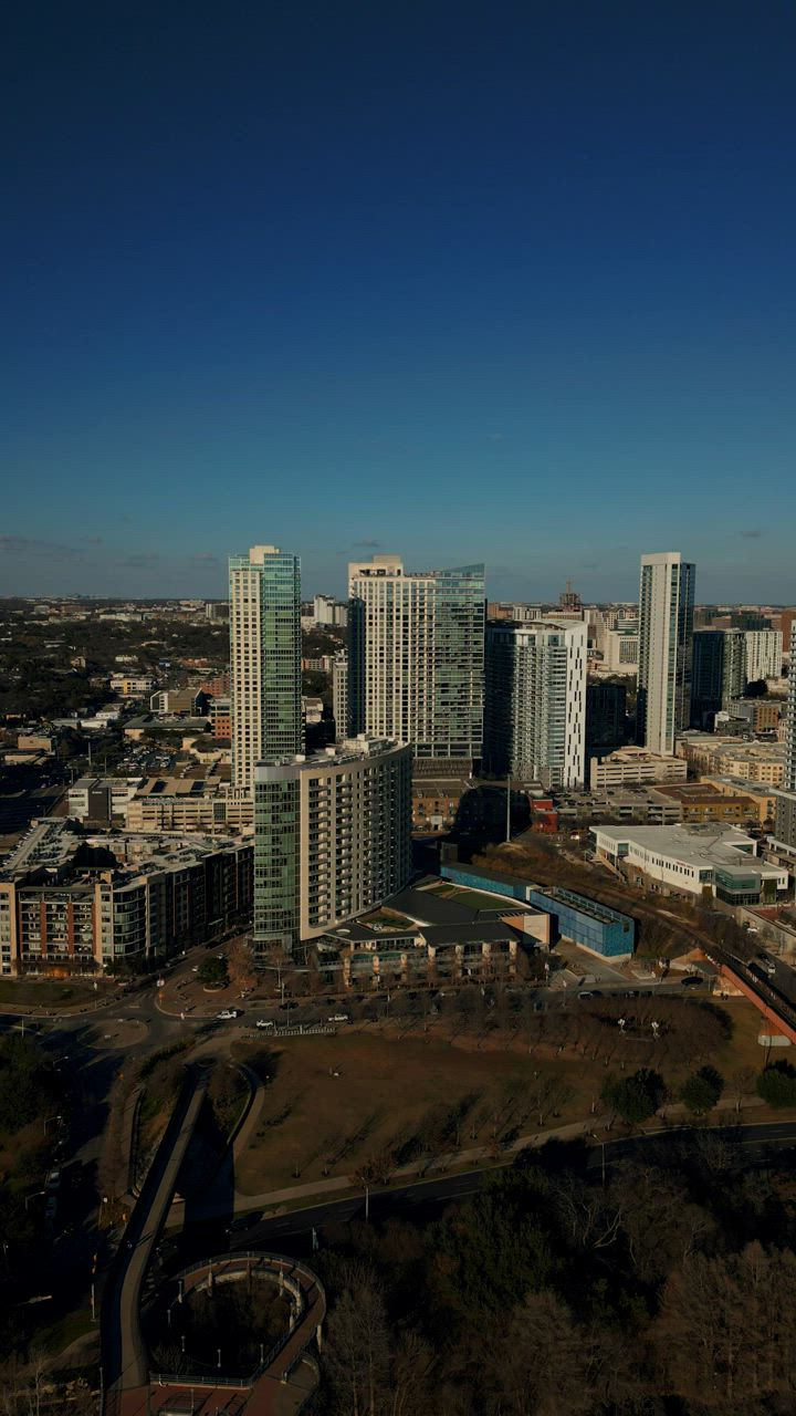 Aerial shot of a city with large buildings - Free Stock Video