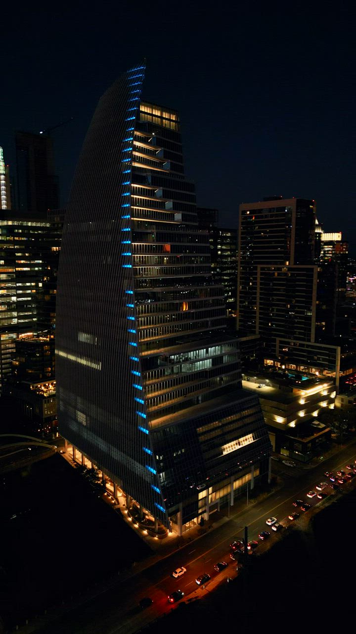 Panoramic aerial shot of a metropolis at night - Free Stock Video