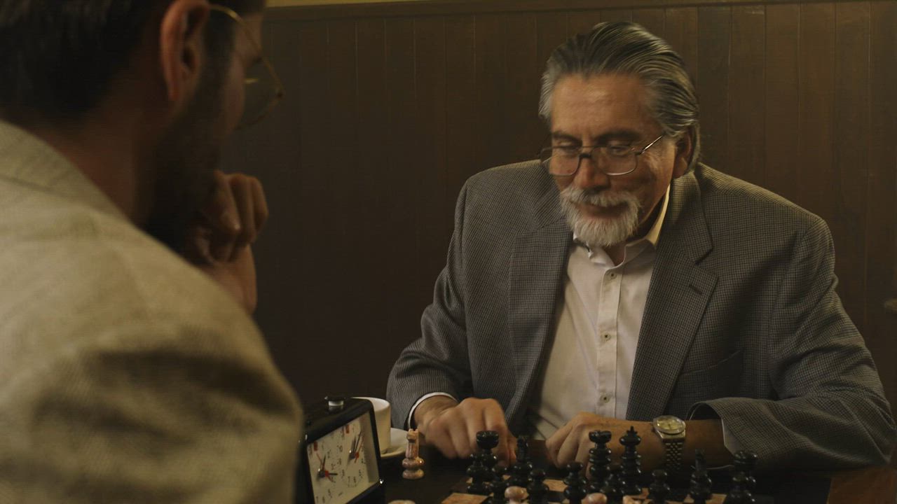 Pair of intellectual men in a game of chess - Free Stock Video