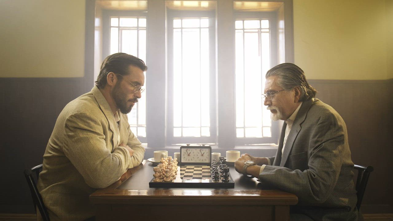 Two intellectual men starting a game of chess - Free Stock Video