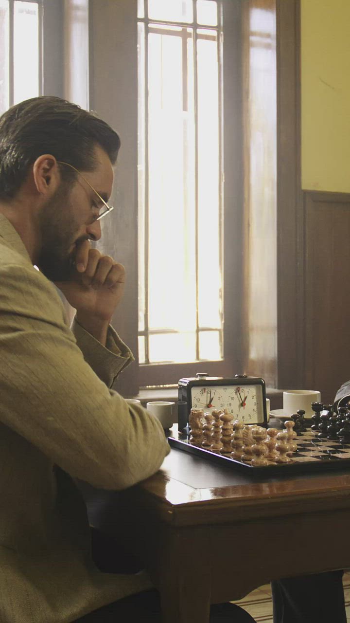 Smart man in a game of chess - Free Stock Video