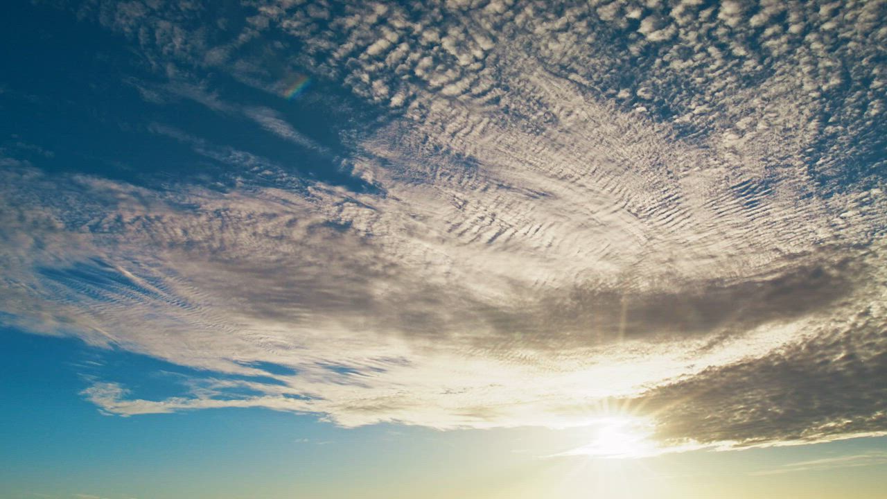Sky view with sun and clouds in a timelapse - Free Stock Video