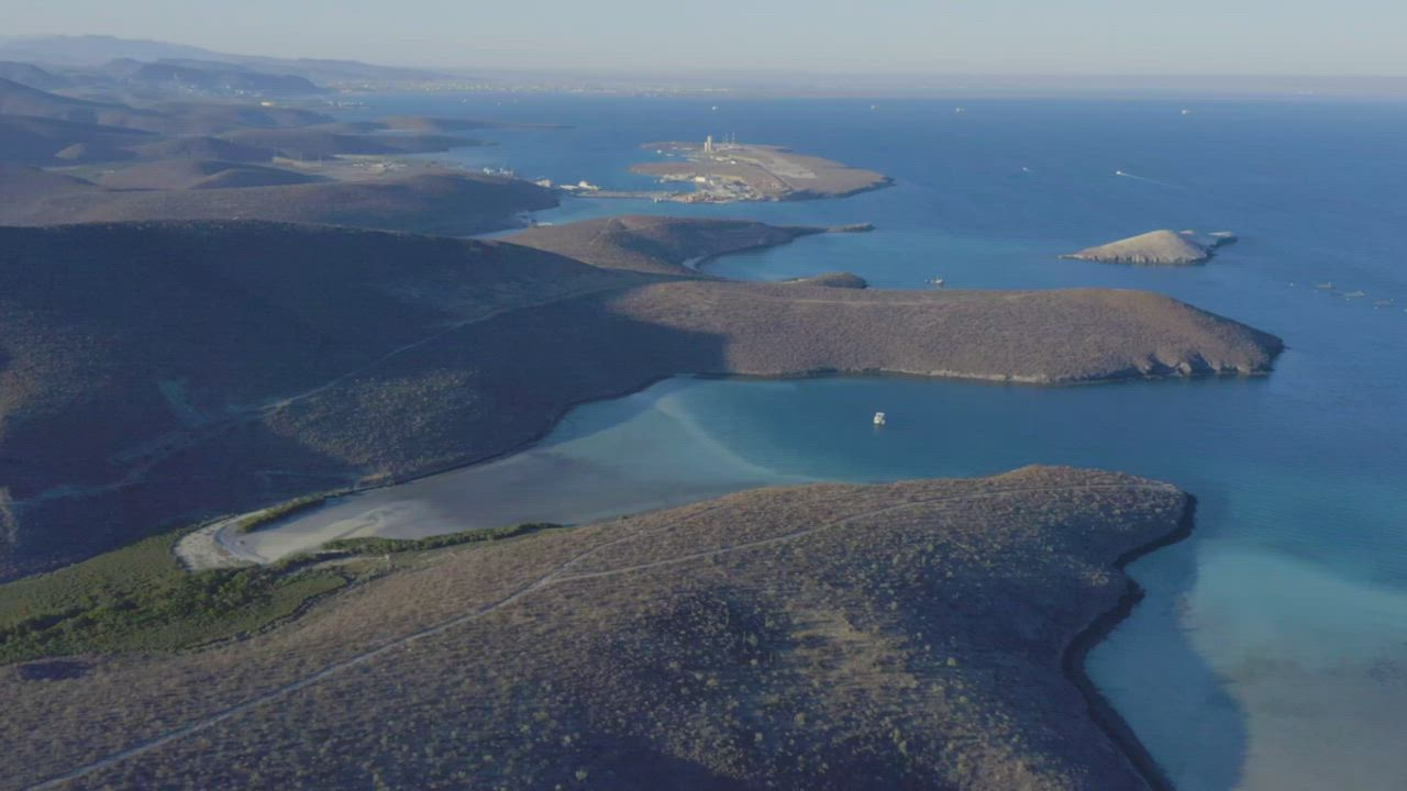 Natural relief on a coast in an aerial view - Free Stock Video