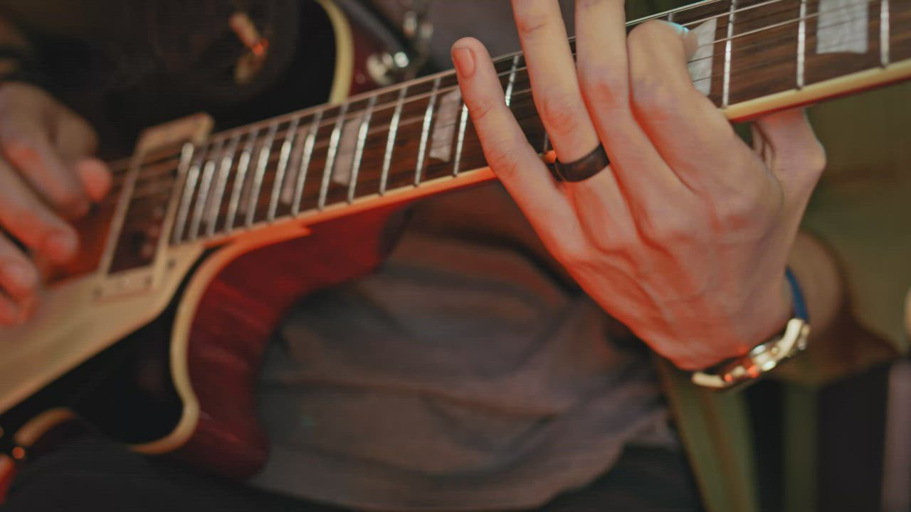 Skillful guitarist playing with great technique - Free Stock Video