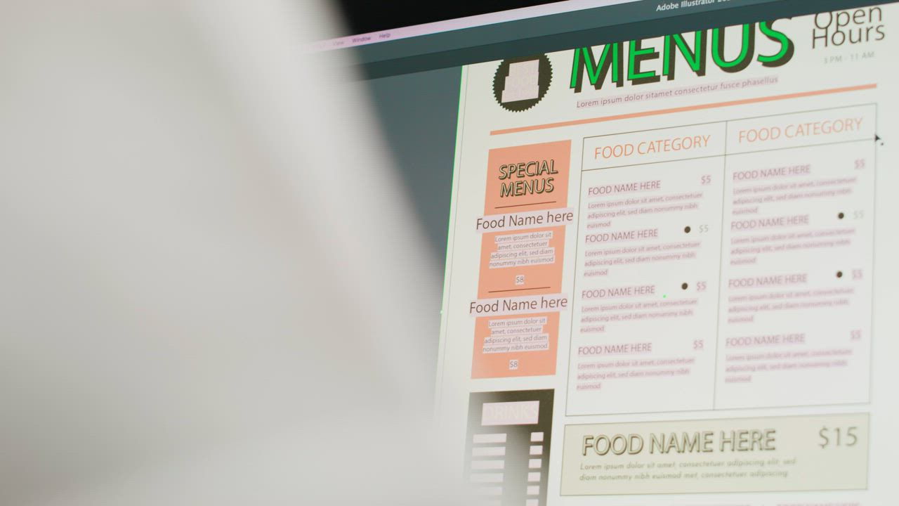 Designing a restaurant menu in a professional graphics design software ...