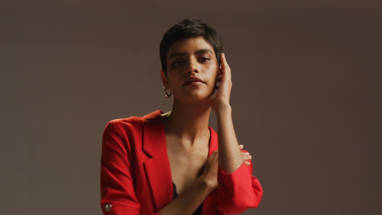 Portrait of a model's face posing for a photoshoot - Free Stock Video