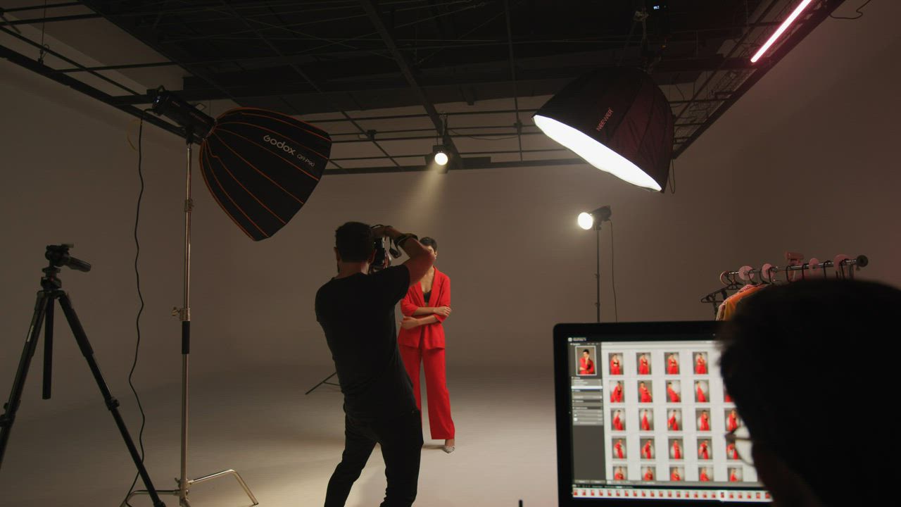 View of a laptop screen with photos from a photo shoot - Free Stock Video