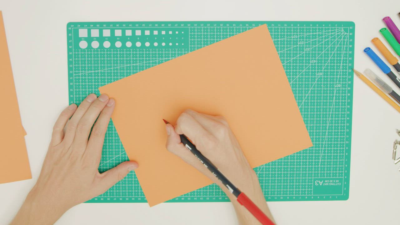 Aerial view of calligrapher writing Love - Free Stock Video