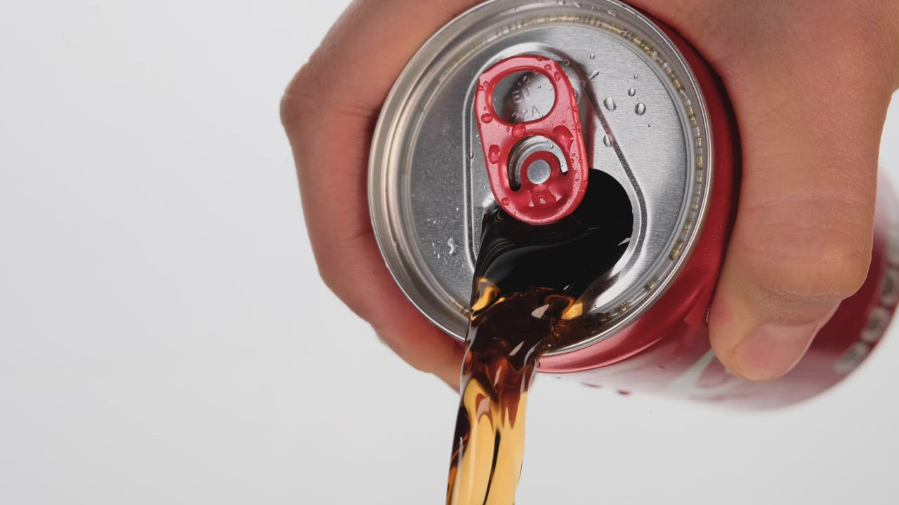Spilling a can of cola - Free Stock Video