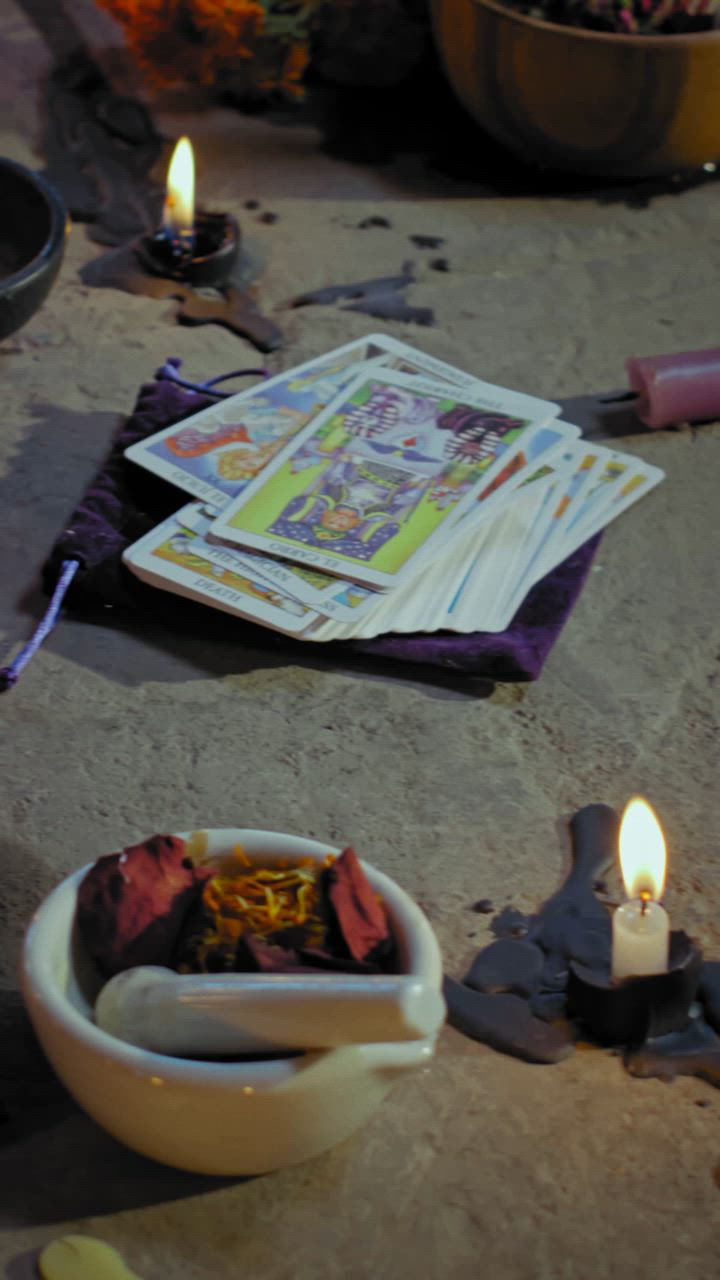An ritual ensemble of tarot cards, candles, and an ancient knife - Free ...