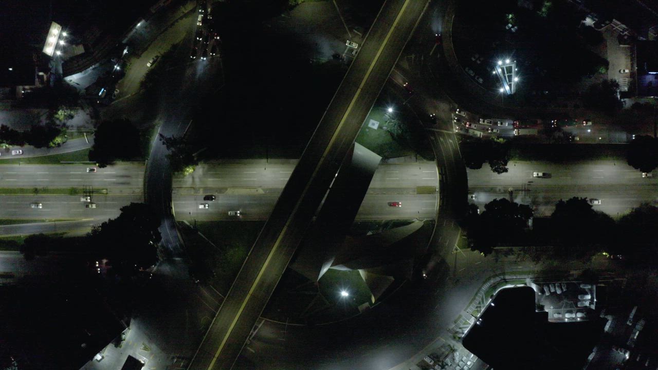 Overhead shot of a night traffic crossroads - Free Stock Video
