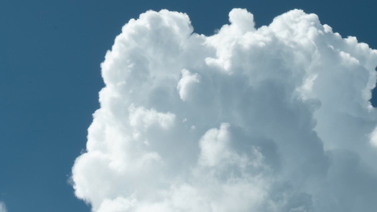 Close up of white clouds moving in the sky - Free Stock Video