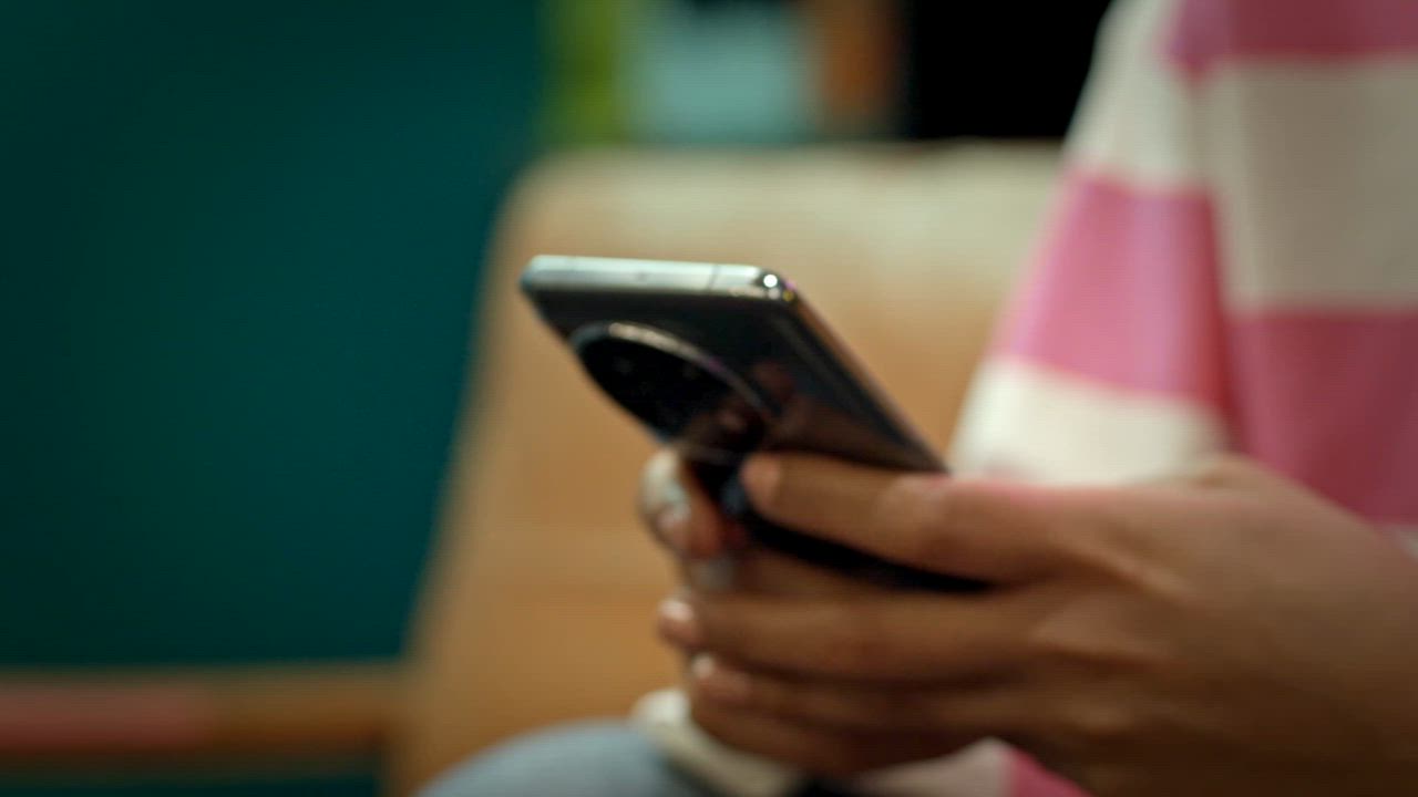 Close up of a woman texting with both hands - Free Stock Video