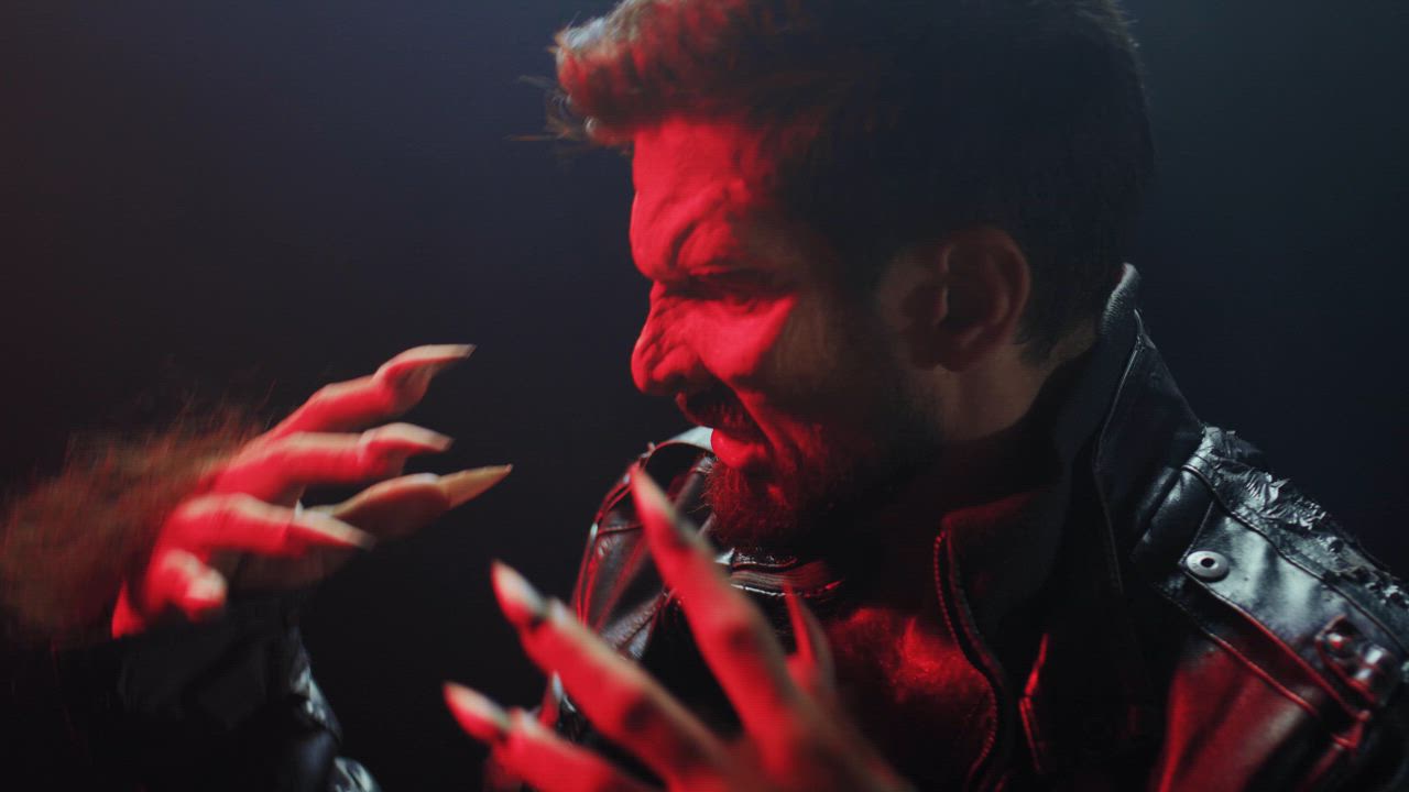 A confused and scary werewolf howls in fear in the middle of the night ...