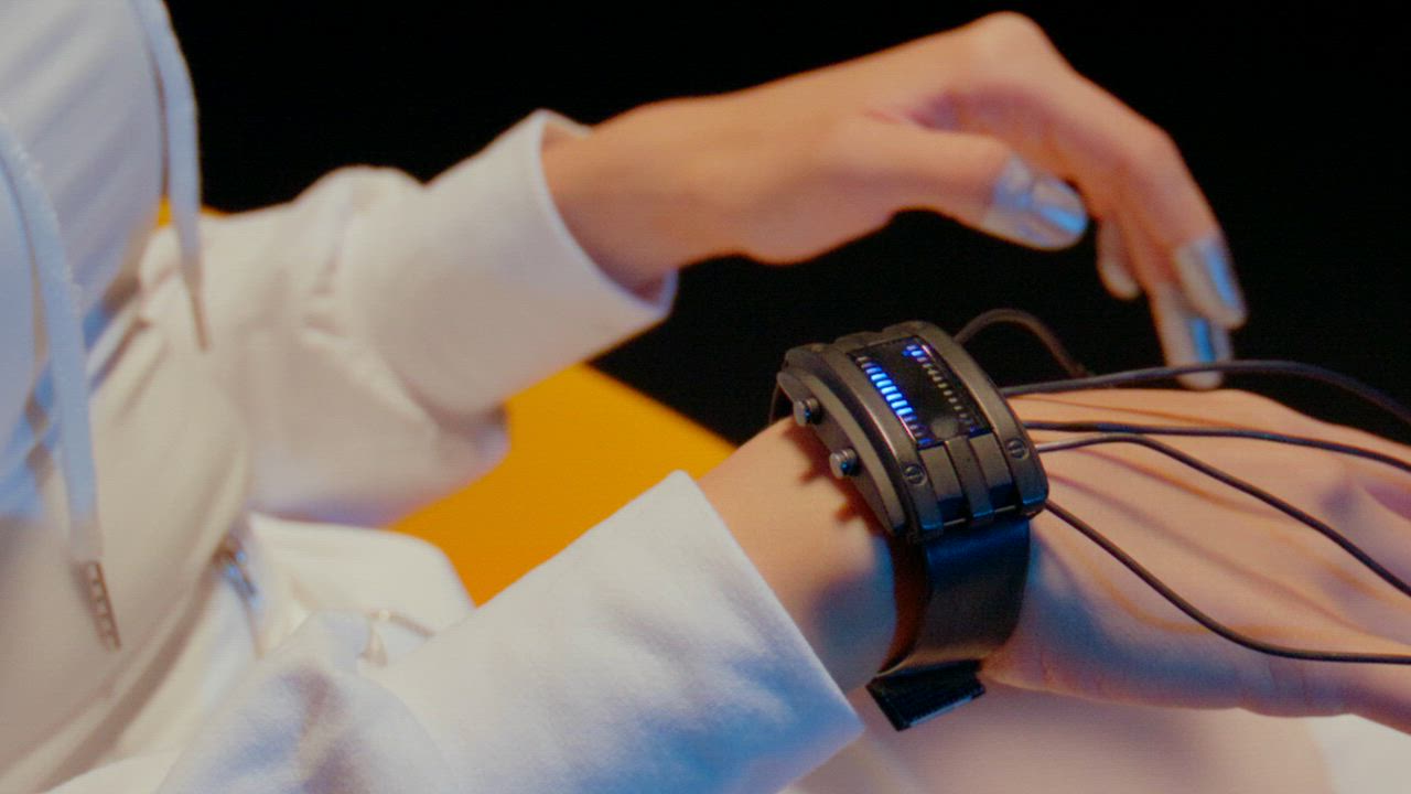 Futuristic finger sensor on a woman's hand - Free Stock Video