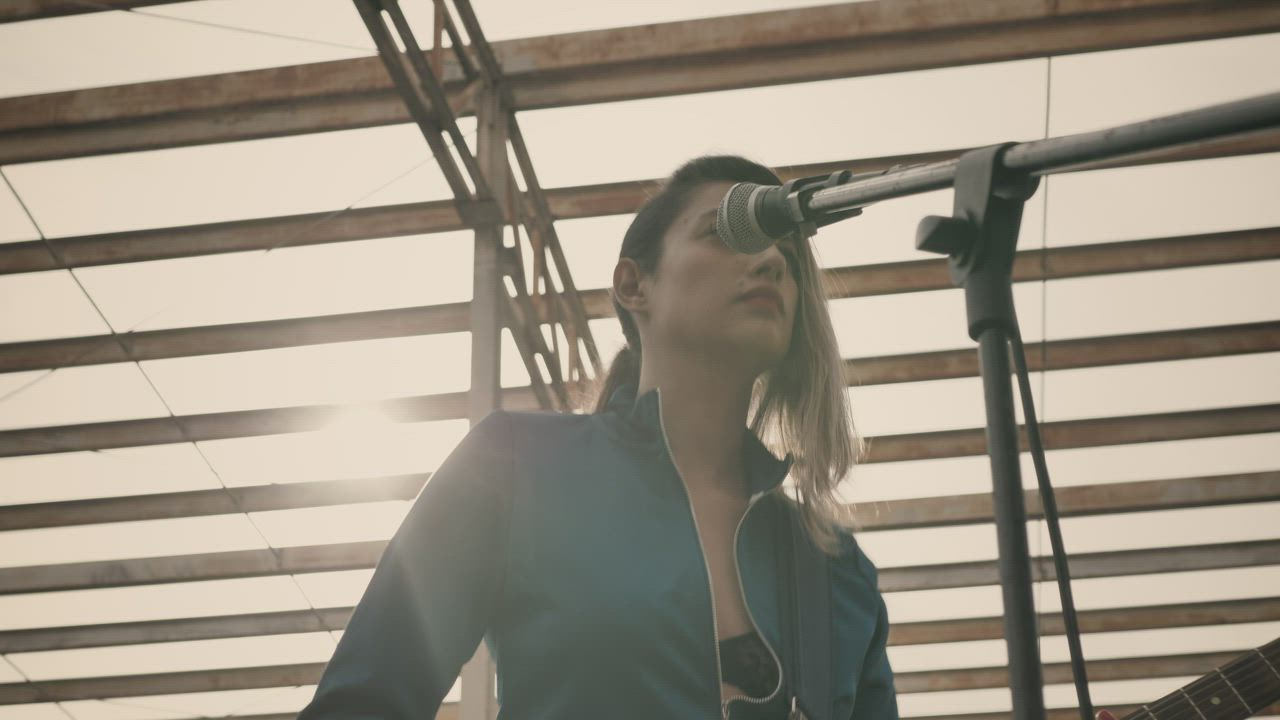 Vocalist and guitarist of a rock band singing - Free Stock Video