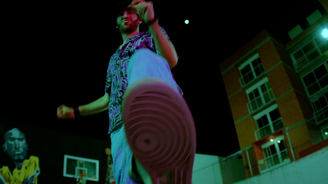 Talented man dancing a choreography at night - Free Stock Video