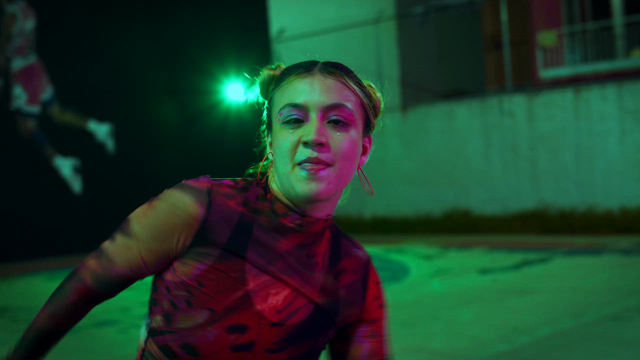 Skillful girl dancing an intense choreography at night - Free Stock Video