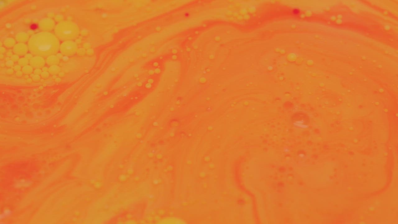 Orange ink simulating volcano lava - Free Stock Video