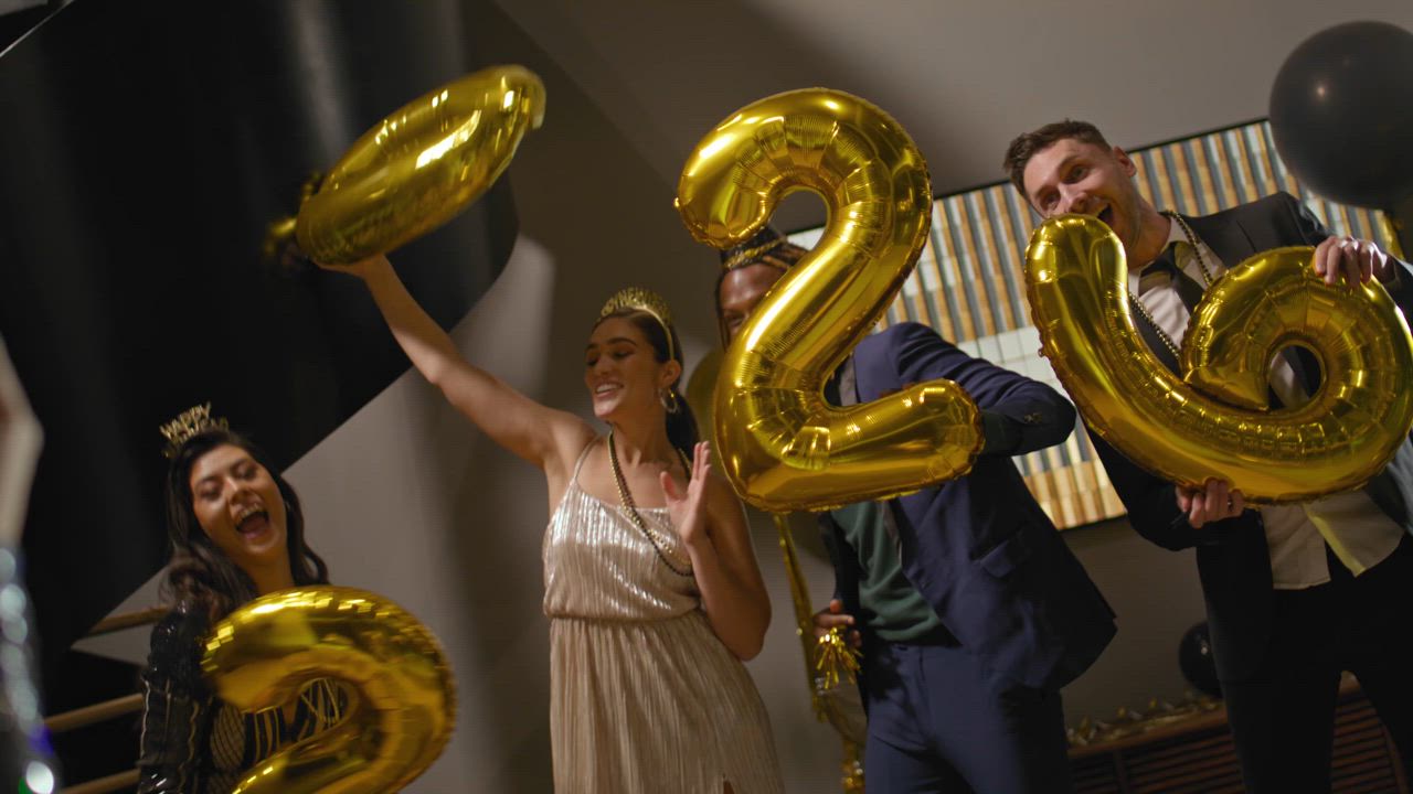 Group of friends celebrating the new year 2026 - Free Stock Video