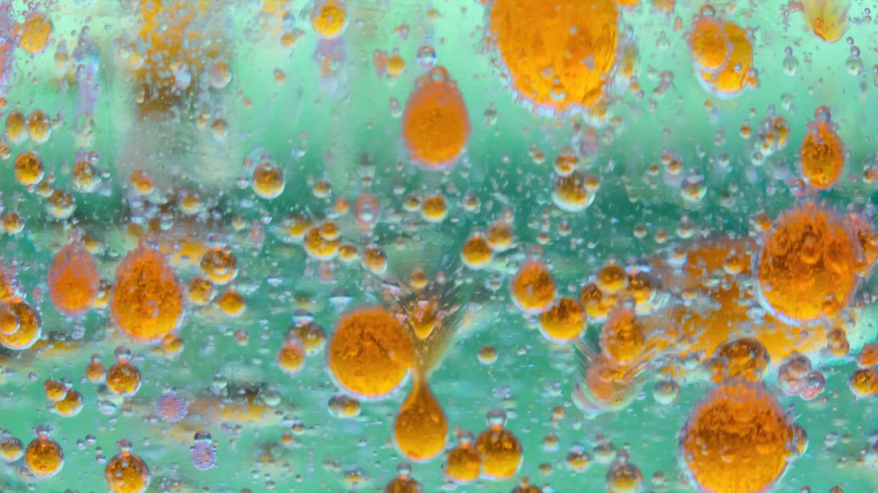 Colorful and dynamic liquid from a lava lamp - Free Stock Video