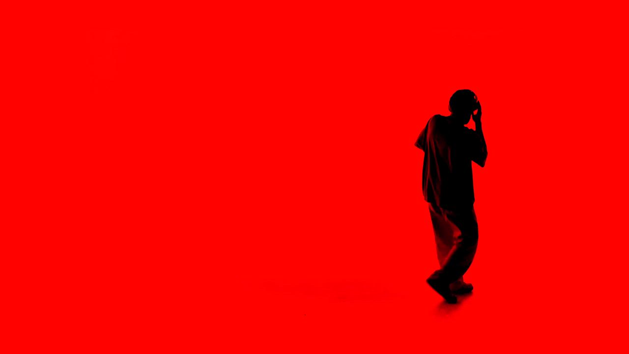 Shadow of a talented dancer on red background - Free Stock Video