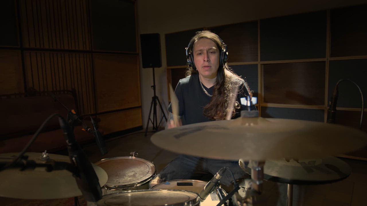 Young drummer recording in a studio - Free Stock Video