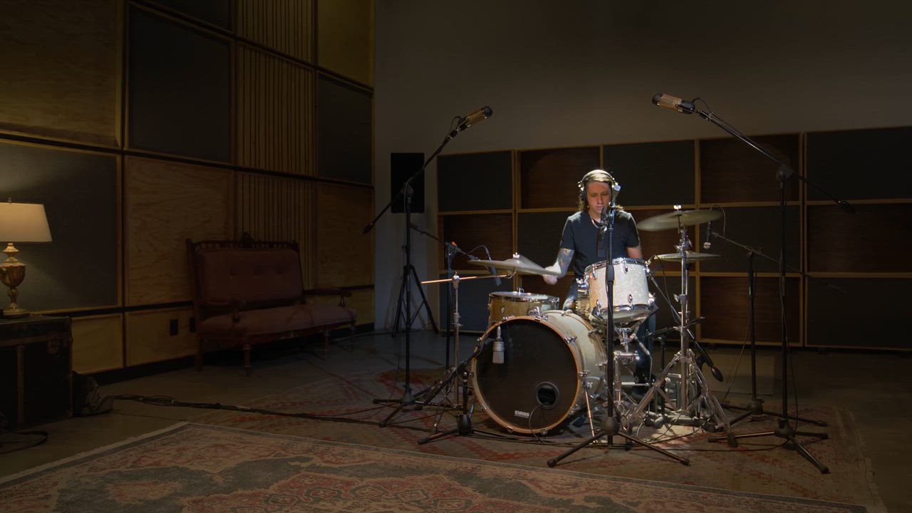 Skilled drummer playing with double pedal in a studio - Free Stock Video