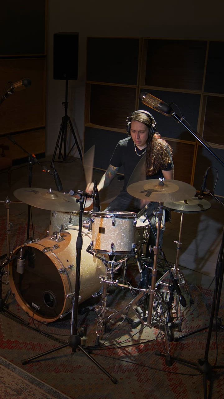 Skilled drummer recording in a studio - Free Stock Video