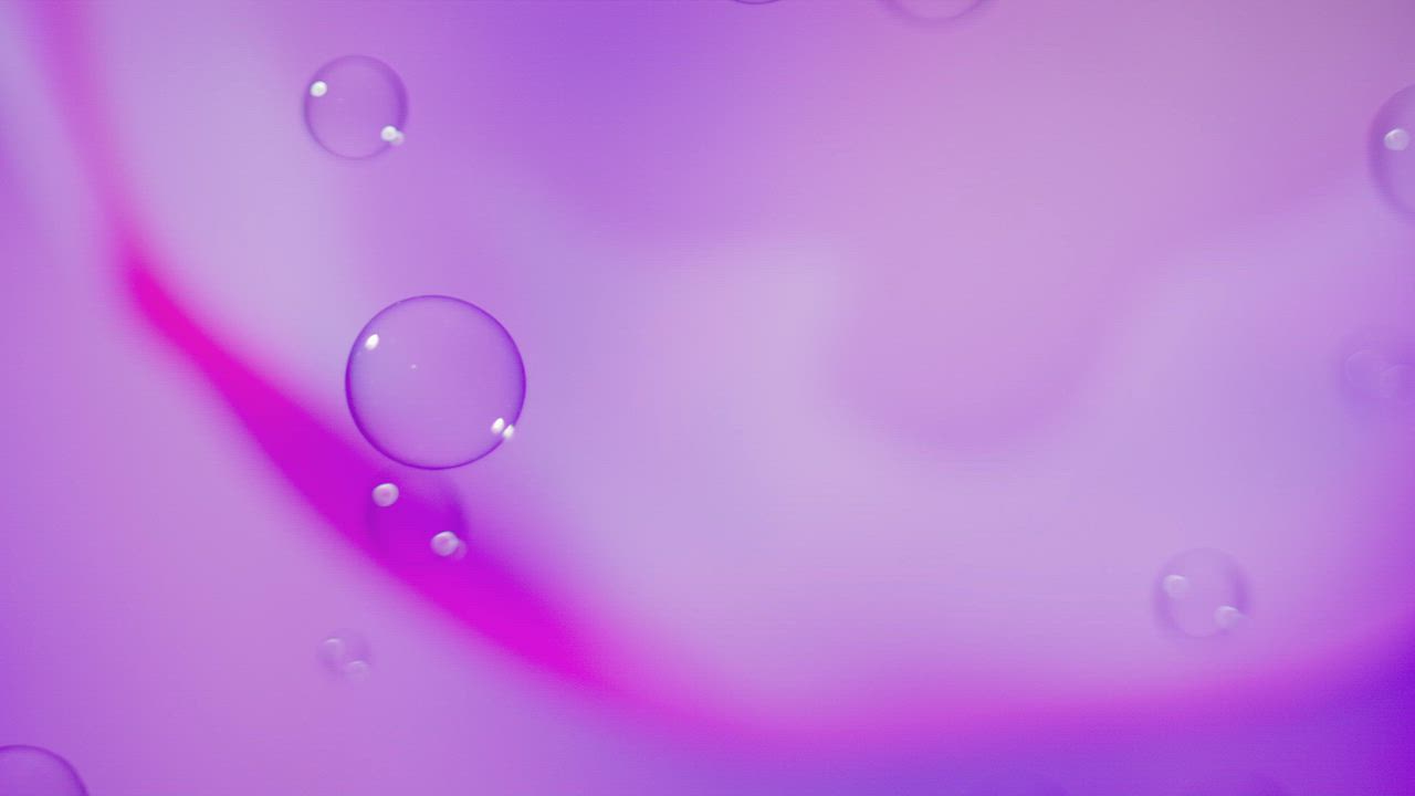 Striking shot of bubbles floating in front of a lilac background - Free ...